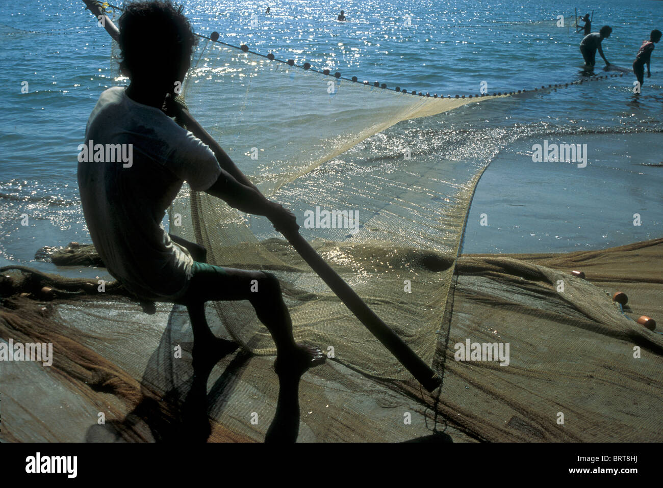 Fisherman hauling nets in southern Goa Stock Photo - Alamy