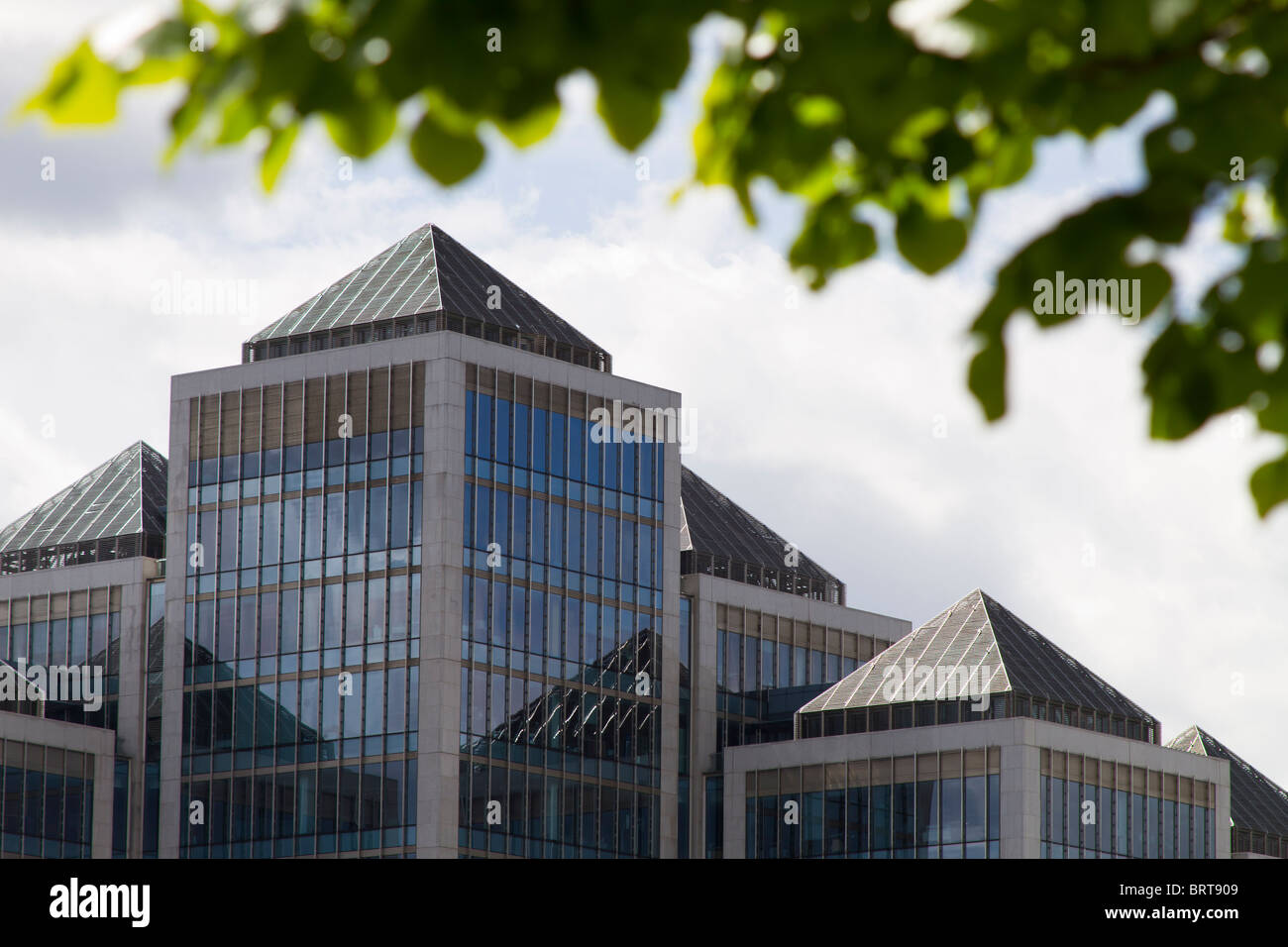Office building with pyramid type roof tops Stock Photo - Alamy