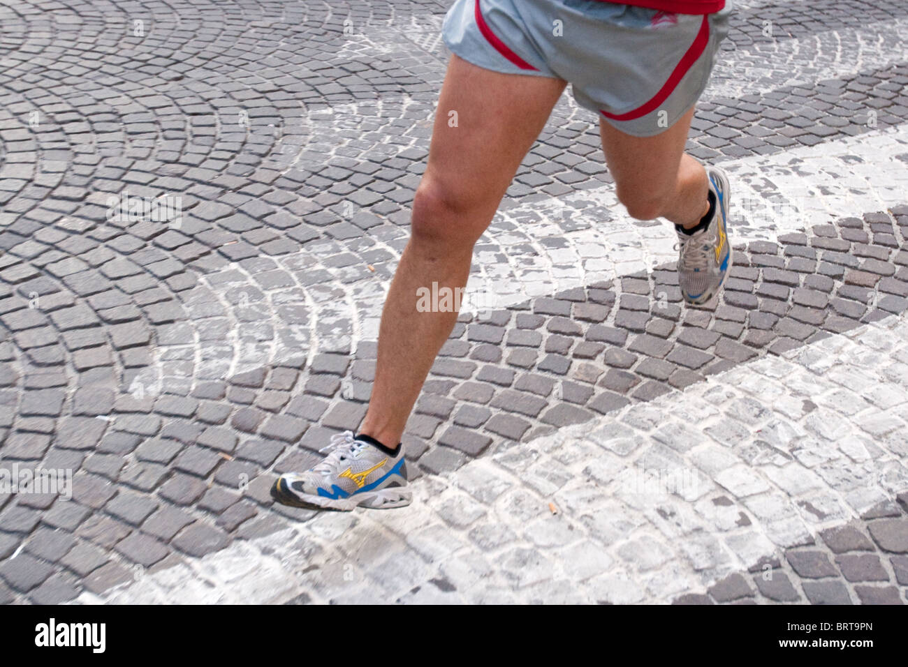 athletic marathon race running legs man road sport jogging runner Stock ...