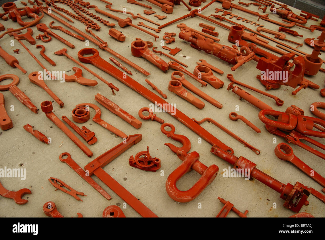 variety of orange tools on display Stock Photo - Alamy