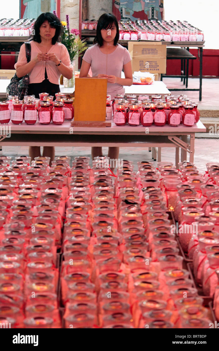 Taiwanese pray in temple for bless of spirit to student examination ...