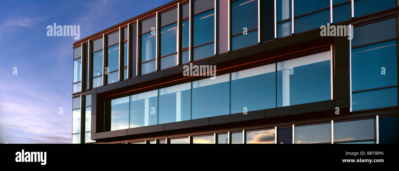 Modern Office Block exterior taken as a panoramic image Stock Photo - Alamy