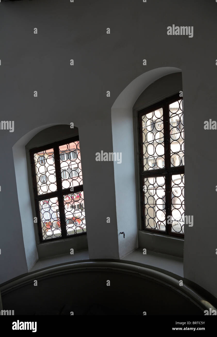 Leaded windows in the round staircase in the town hall tower in ...