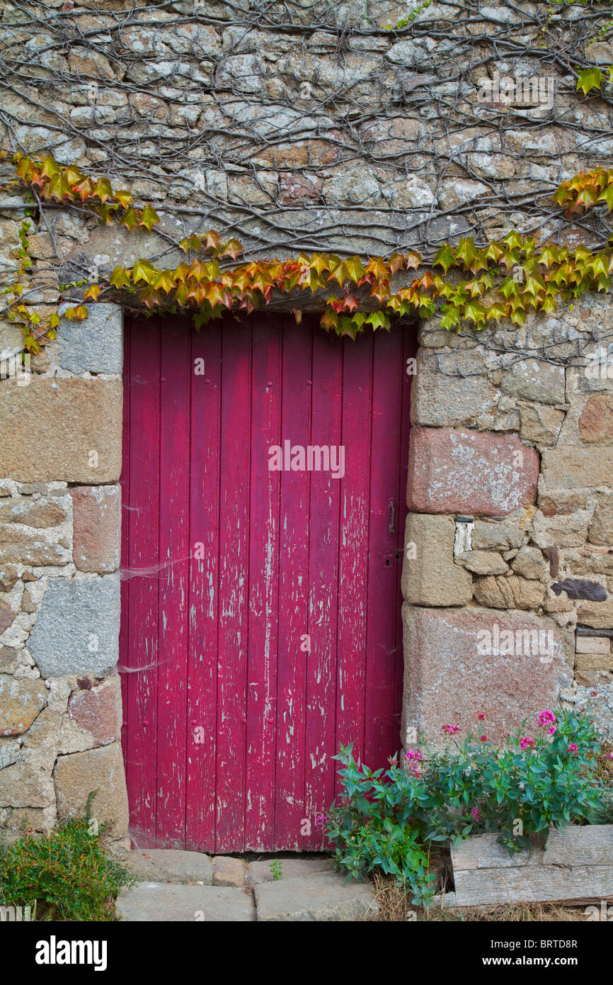 Red door in Normandy Stock Photo - Alamy