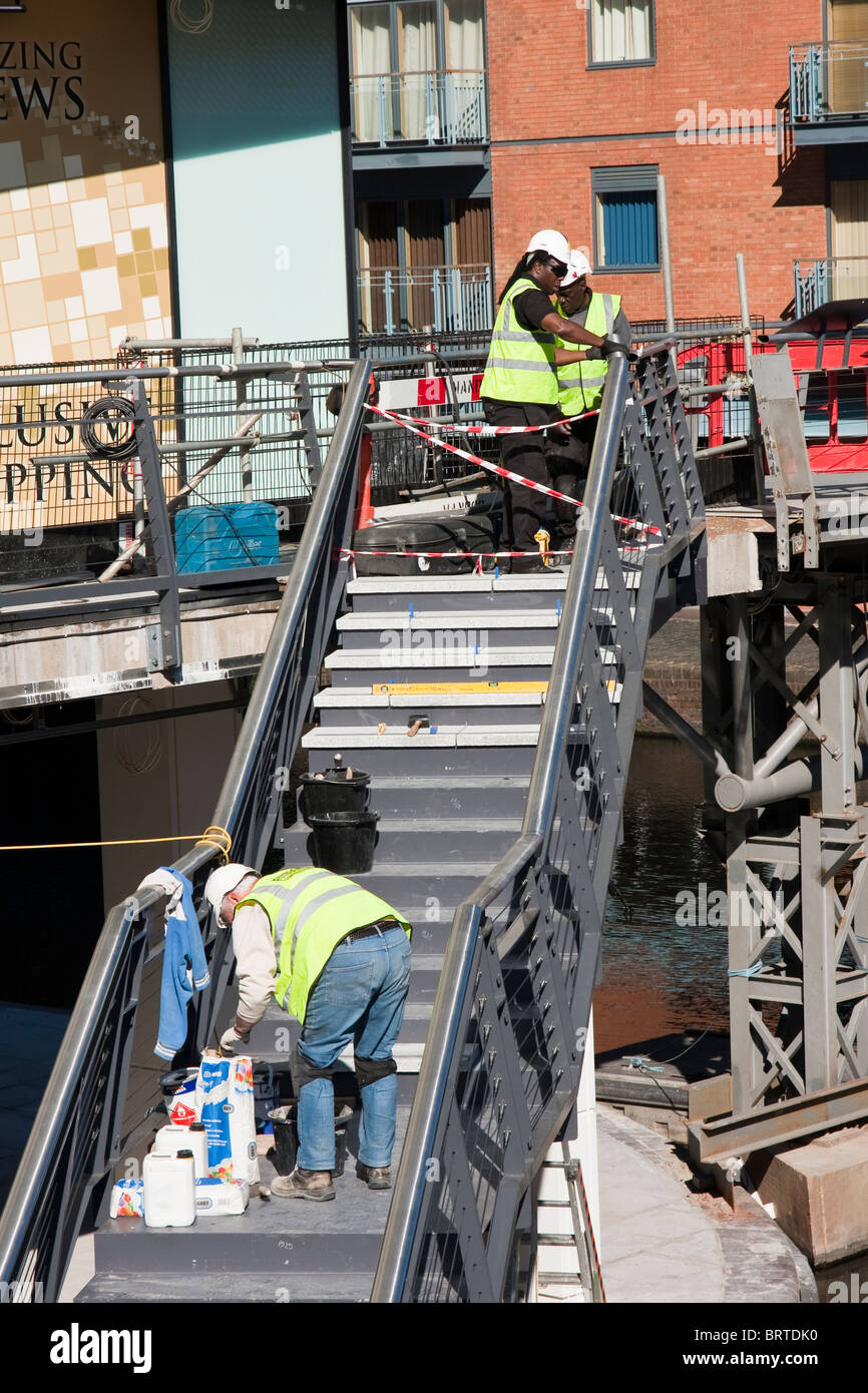 Workmen carrying out building works Stock Photo - Alamy