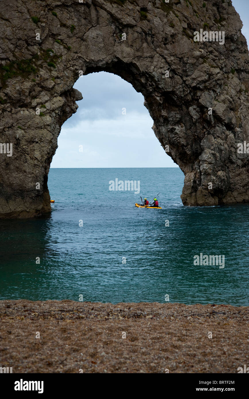Kayaks in the sea at Durdle Door Dorset England UK Stock Photo - Alamy