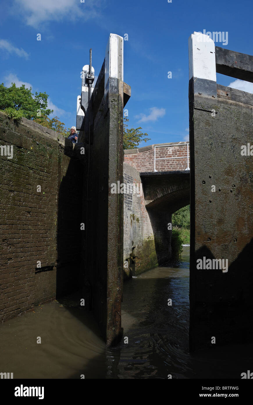 The gates of Weston Lock being opened. The Trent and Mersey Canal ...