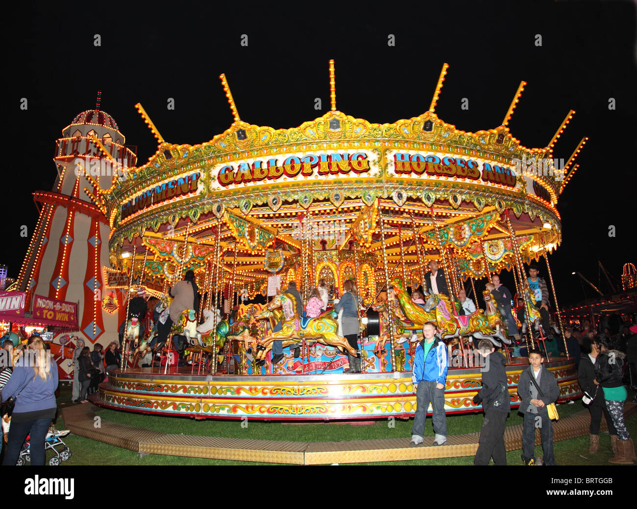 A carousel at the Goose Fair, Nottingham, England, U.K Stock Photo - Alamy