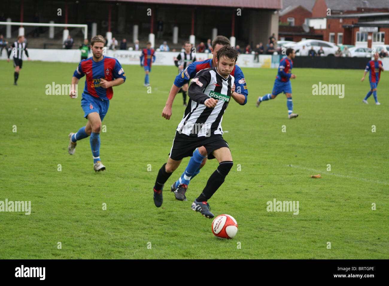 Chorley Striker Mark Houghton attacking against AFC Fylde Stock Photo ...