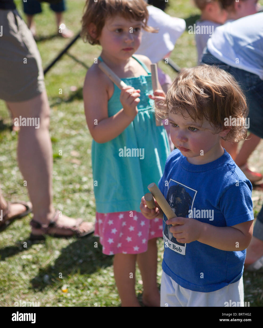 Children with sticks hi-res stock photography and images - Alamy