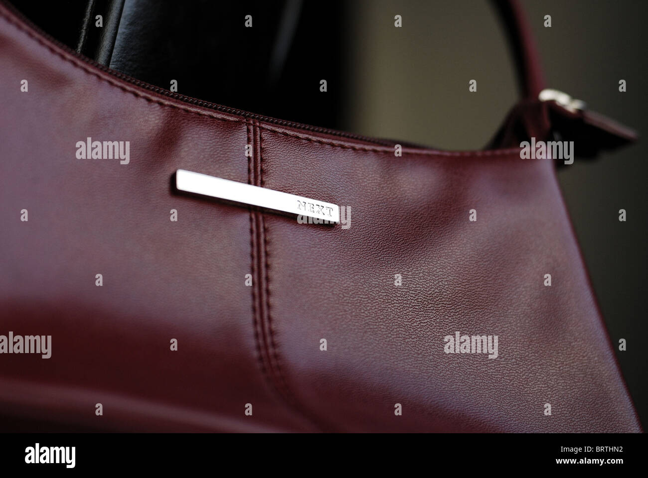 A ladies red leather handbag made by Next Stock Photo - Alamy