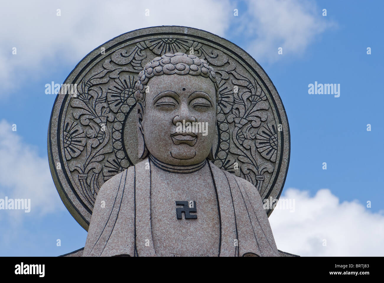 Chinese Buddha with Swastika Stock Photo - Alamy