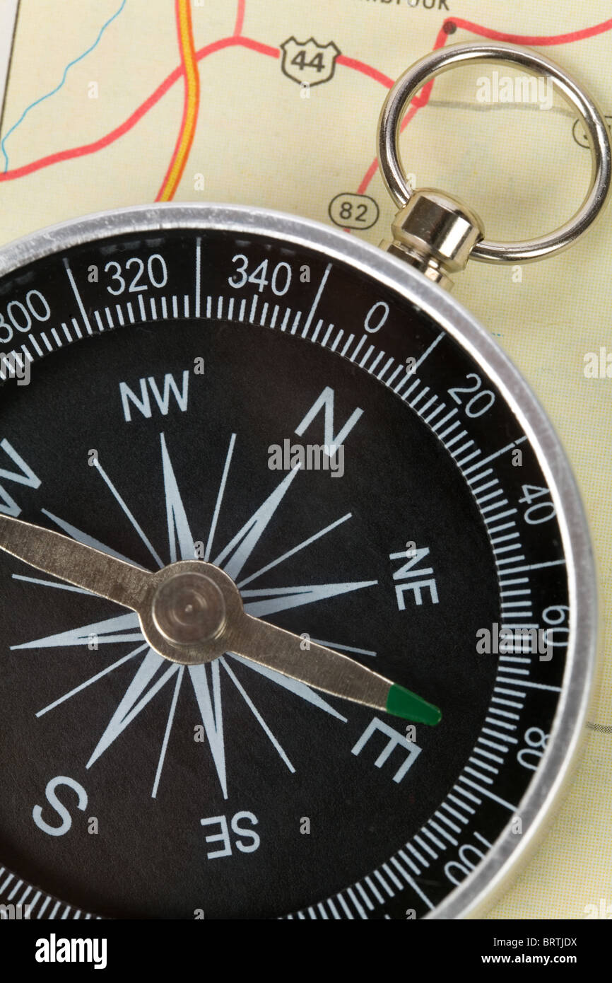 Compass and map close up shot Stock Photo - Alamy