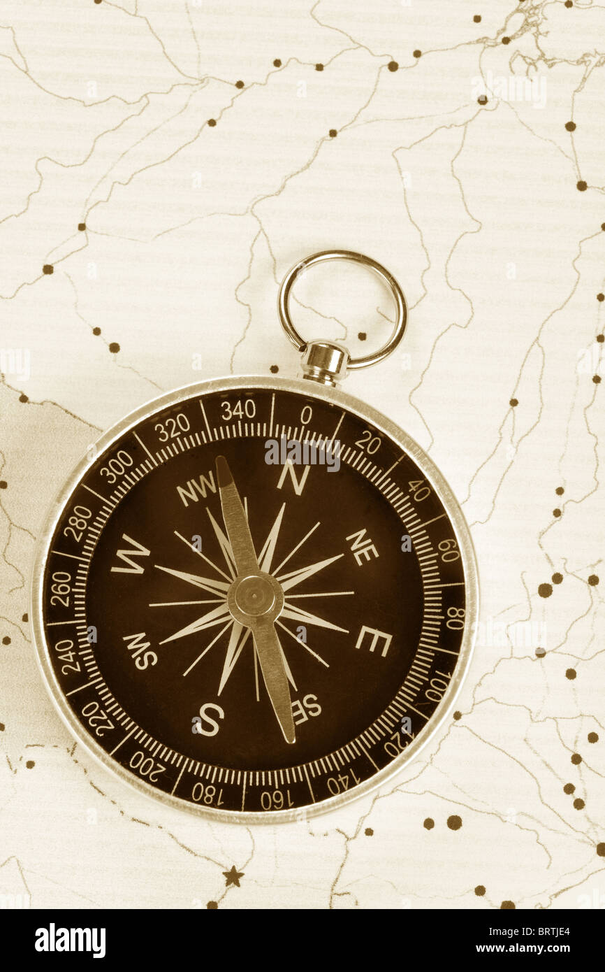 Compass and map close up shot Stock Photo - Alamy