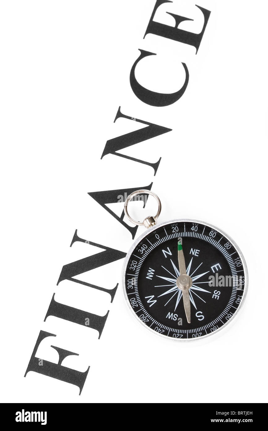 headline finance and Compass, concept of financial choice Stock Photo ...