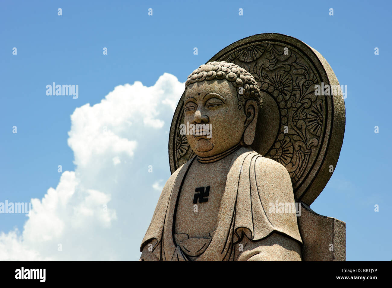 Chinese Buddha with Swastika Stock Photo - Alamy