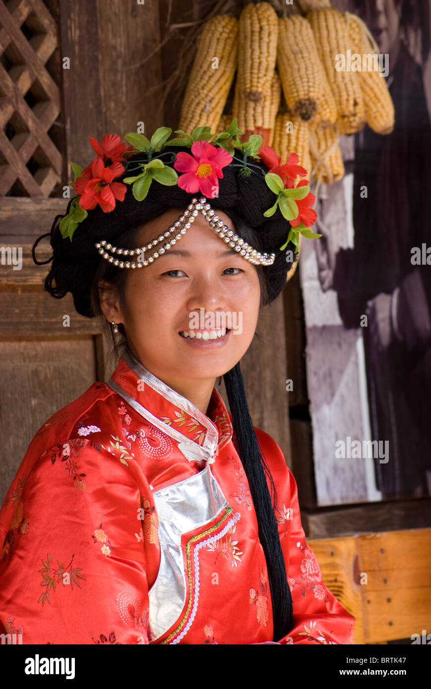 Yunnan lady in her costume Stock Photo - Alamy