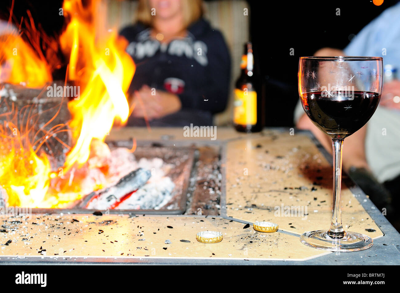 Bonfire happy hour Stock Photo - Alamy