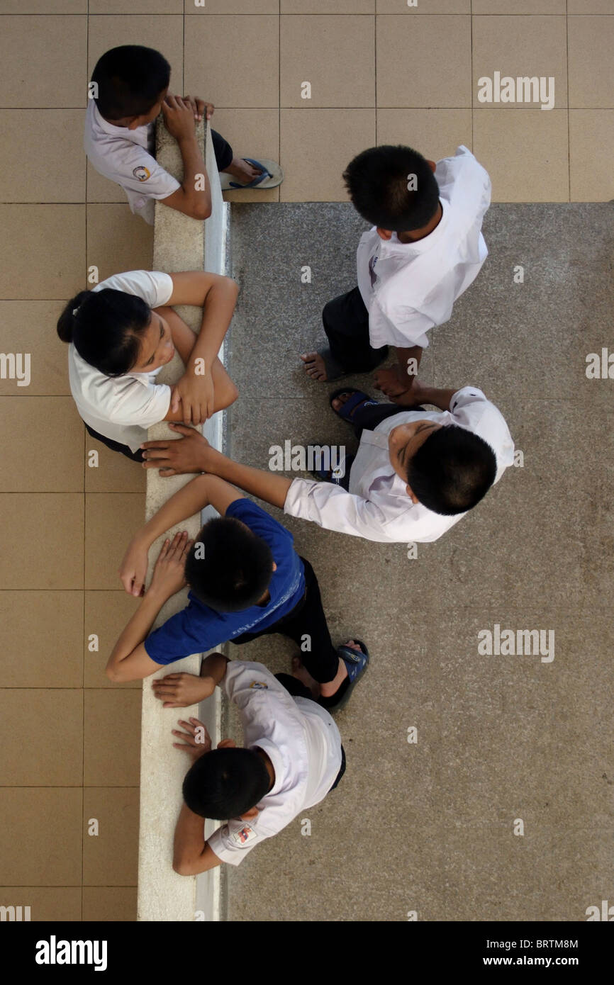 Students without vision (blind) are gathered at a wall after school at ...
