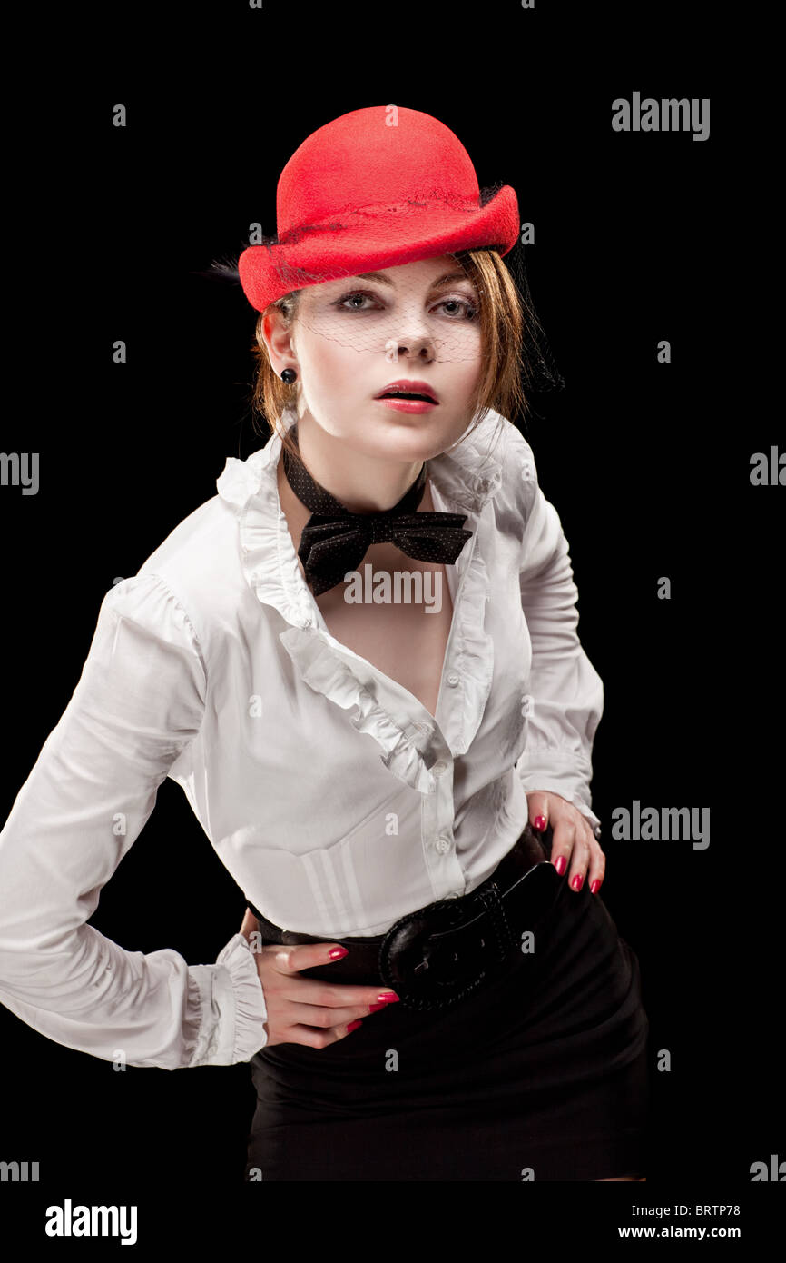 Portrait of a pretty young woman with red bonnet Stock Photo - Alamy