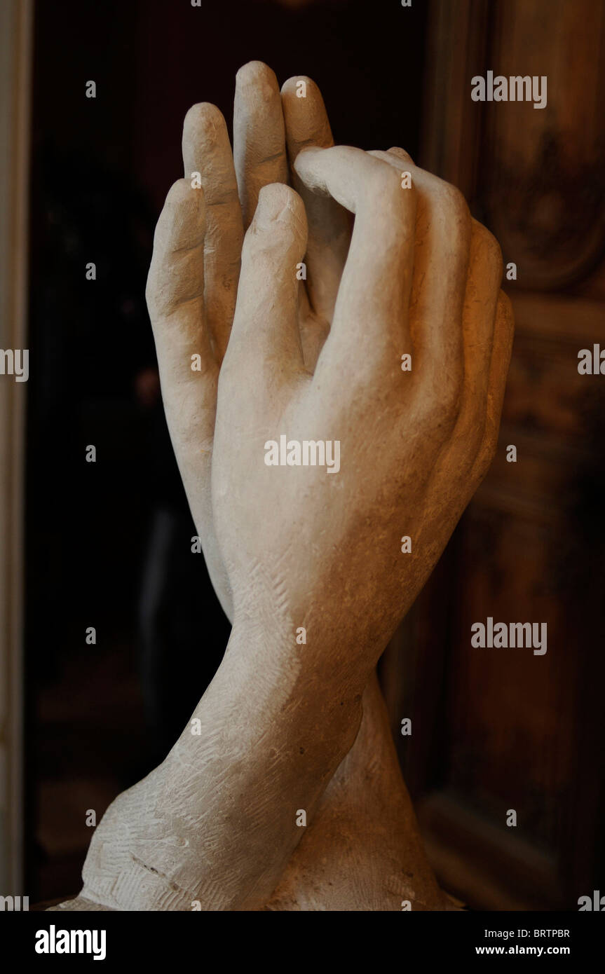 Sculpture of hands on display inside the Musée Rodin, a museum ...