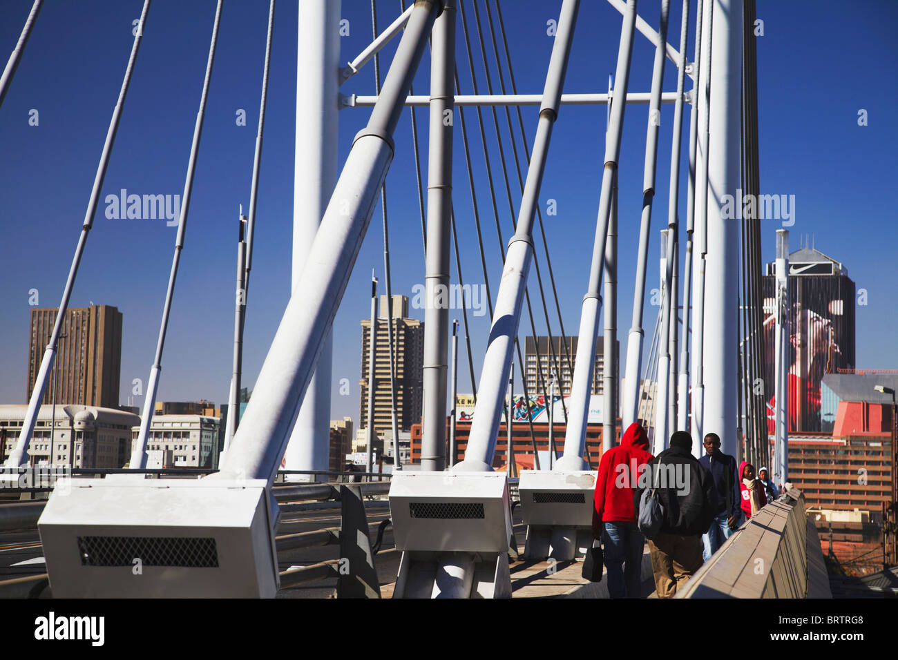 People crossing Nelson Mandela Bridge, Newtown, Johannesburg, Gauteng ...