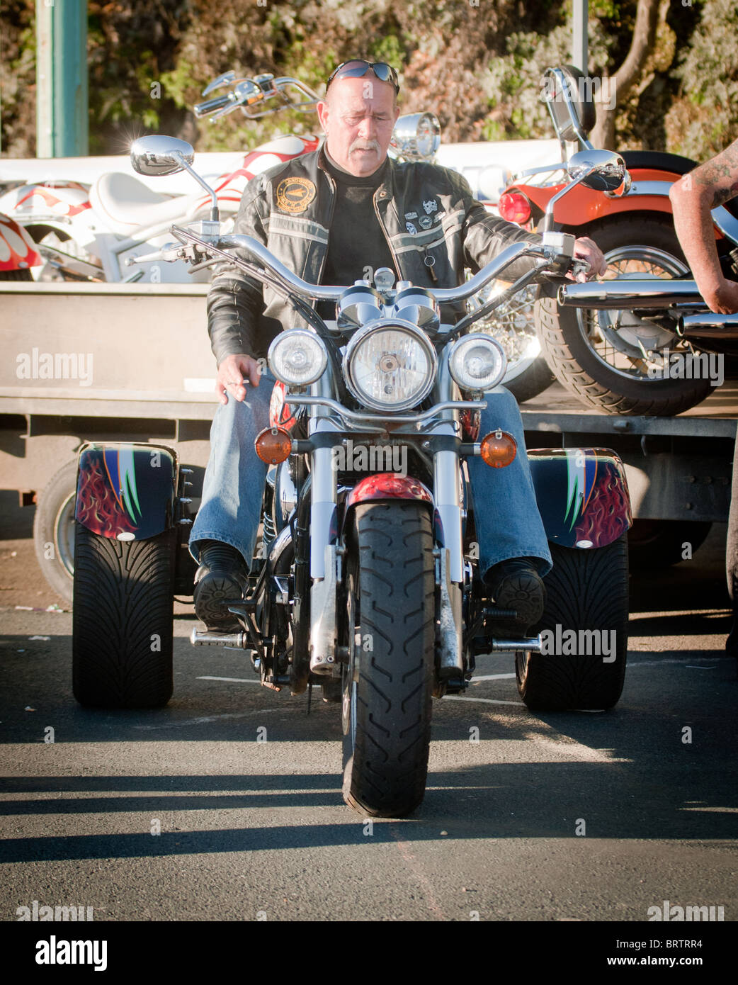 Man on motor trike Stock Photo - Alamy