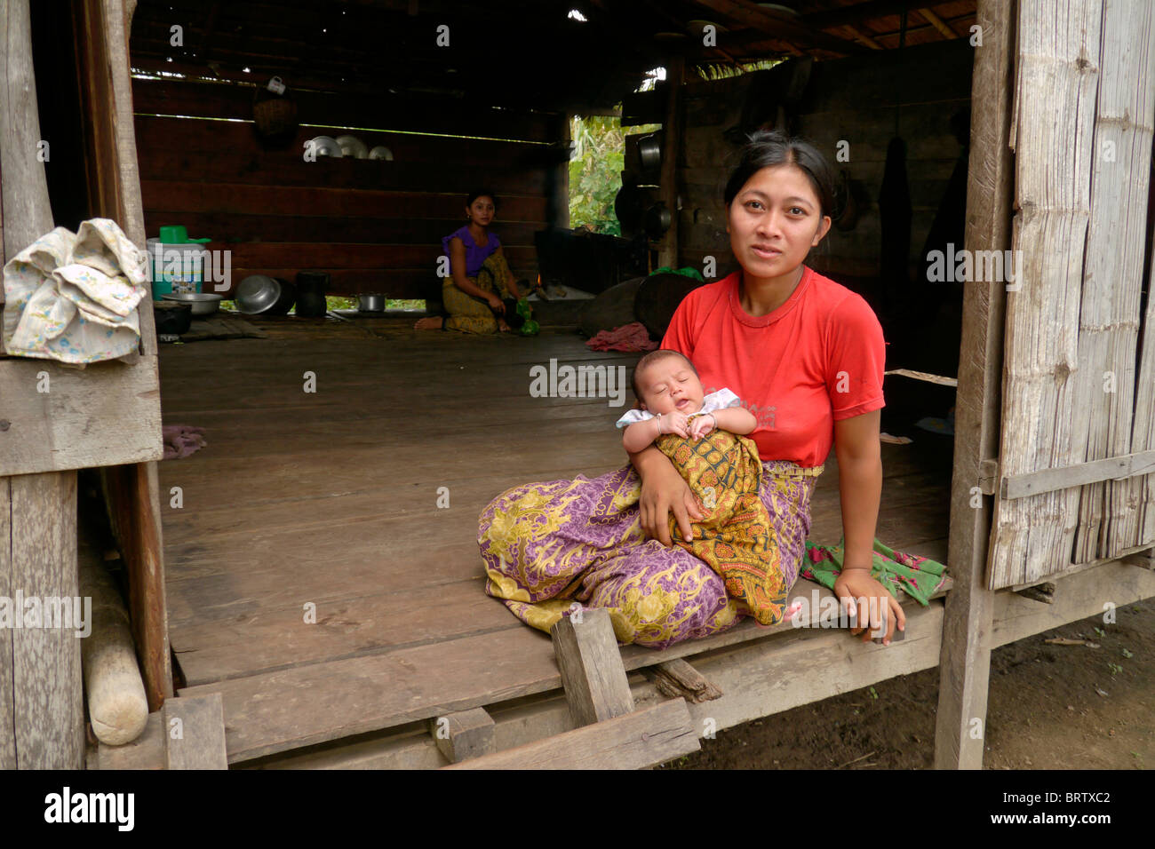 CAMBODIA Lib Kham (23) with her newborn baby, Ban Bung village, Stung ...