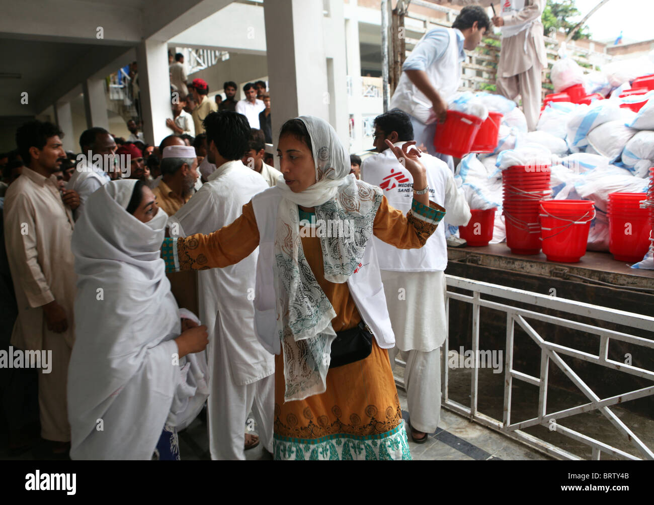charity distribution to flood victims in pakistan Stock Photo - Alamy