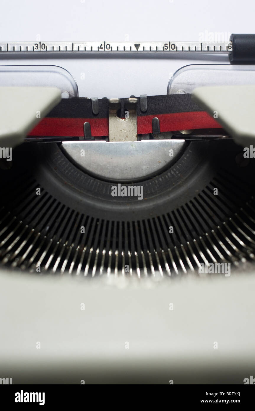 a close up of typewriter, focus on paper where message will be typed ...
