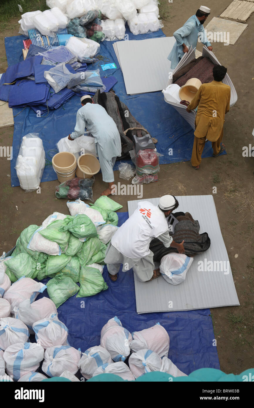 charity distribution to flood victims in pakistan Stock Photo - Alamy