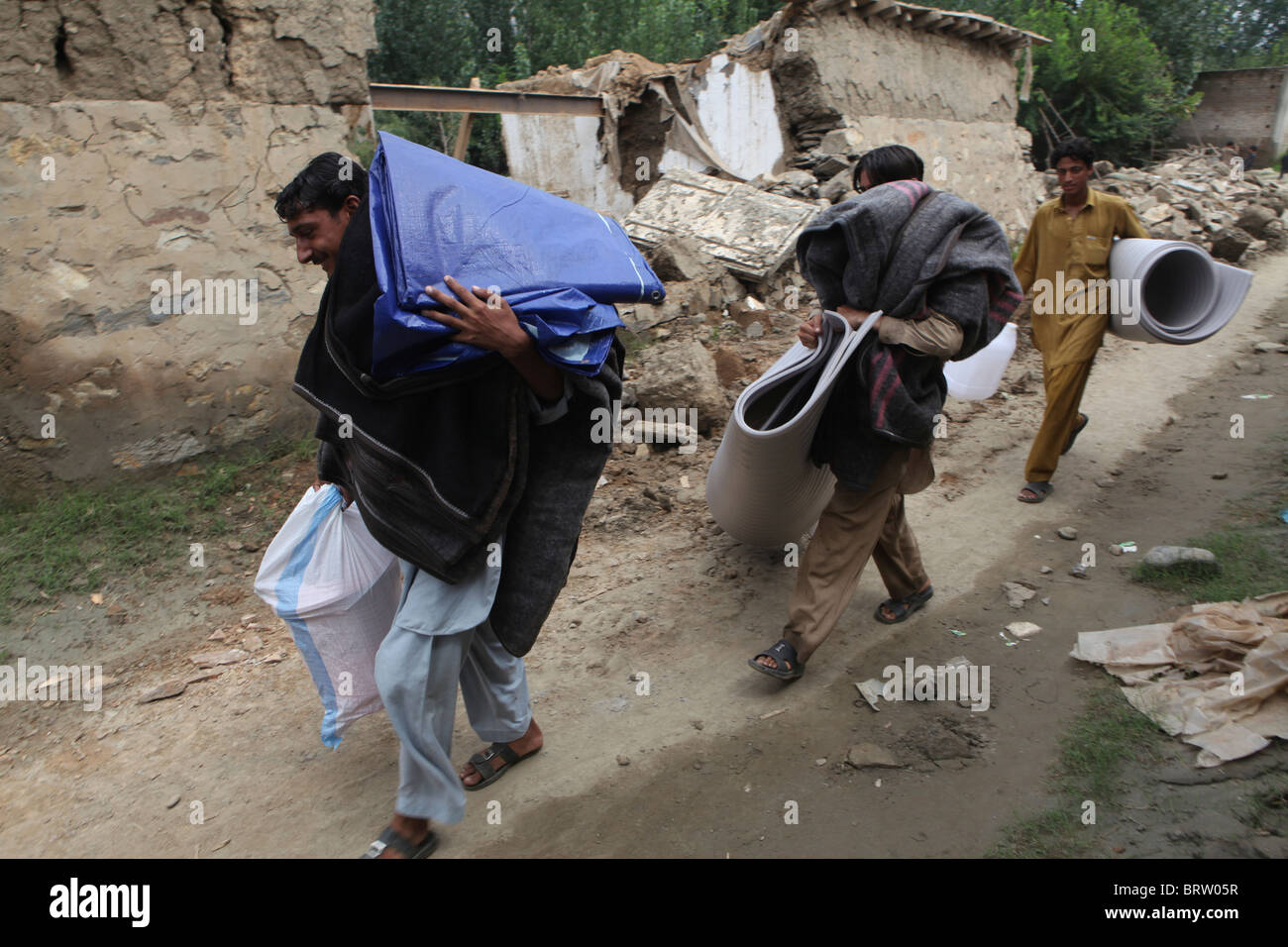 charity distribution to flood victims in pakistan Stock Photo - Alamy