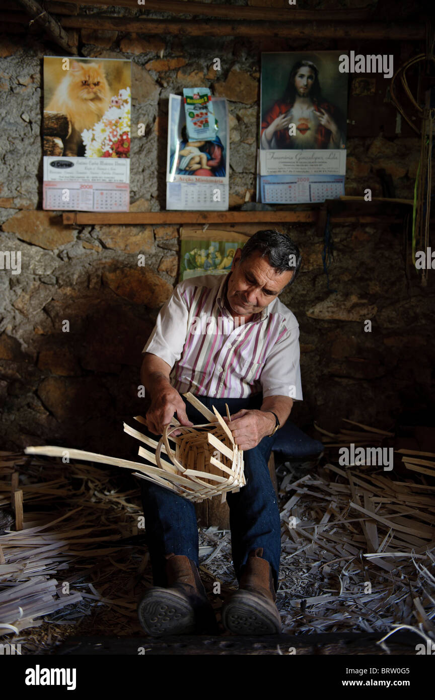 Portuguese man basket weaving near Fundão, Portugal, Europe Stock Photo ...