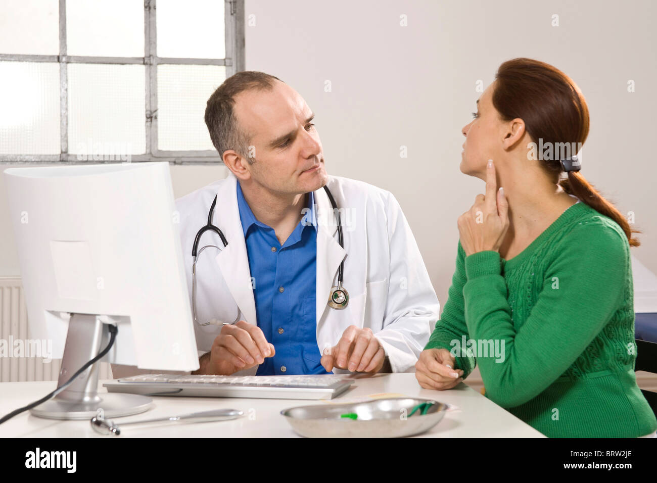 Female patient with skin problem at the doctor Stock Photo - Alamy