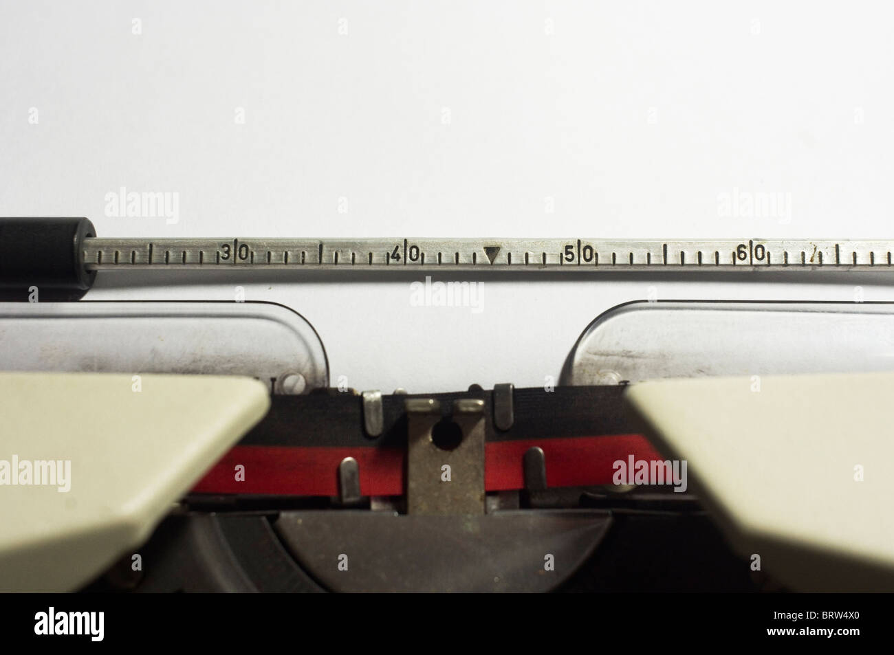 a close up of typewriter, focus on paper where message will be typed ...