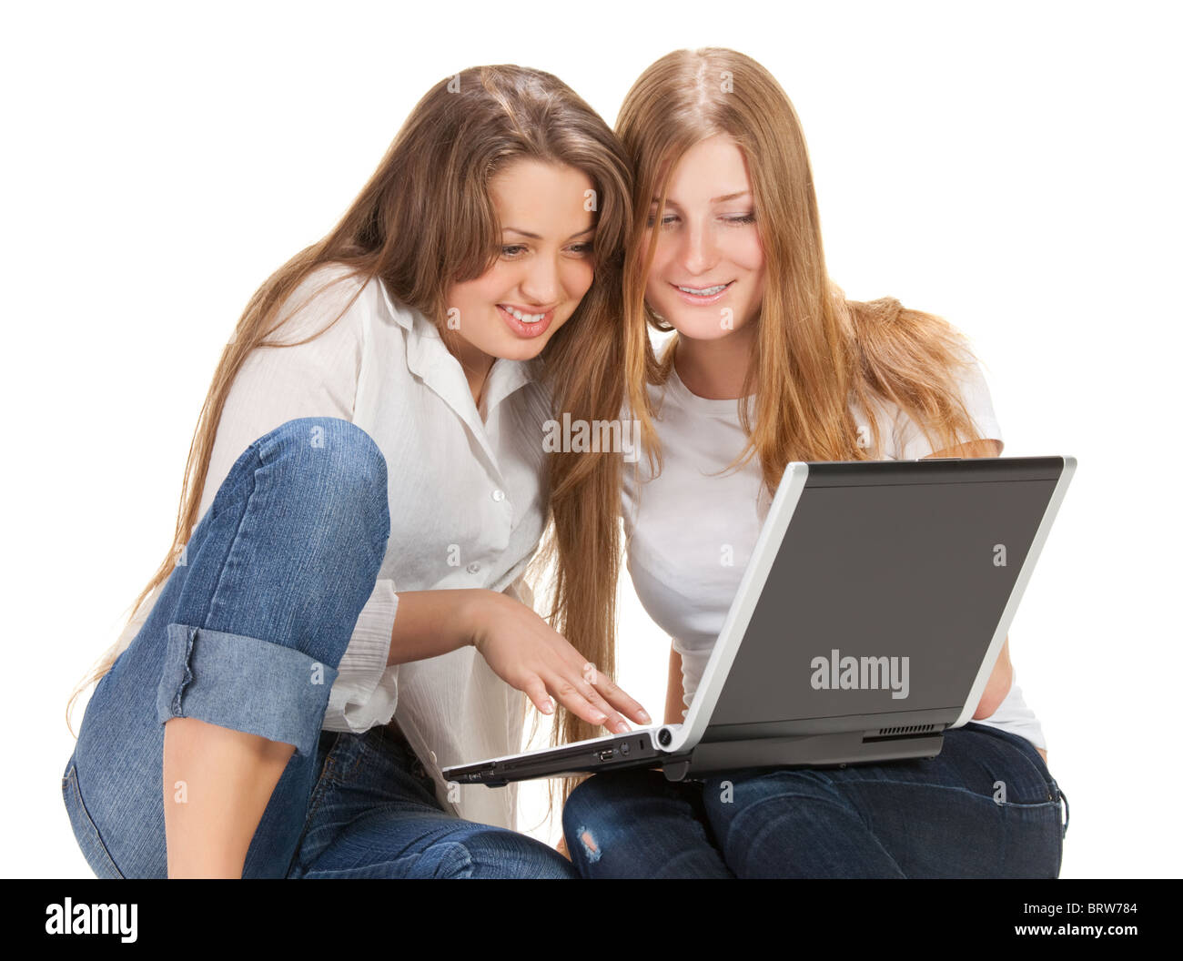 two young happy student girl work on laptop computer Stock Photo - Alamy