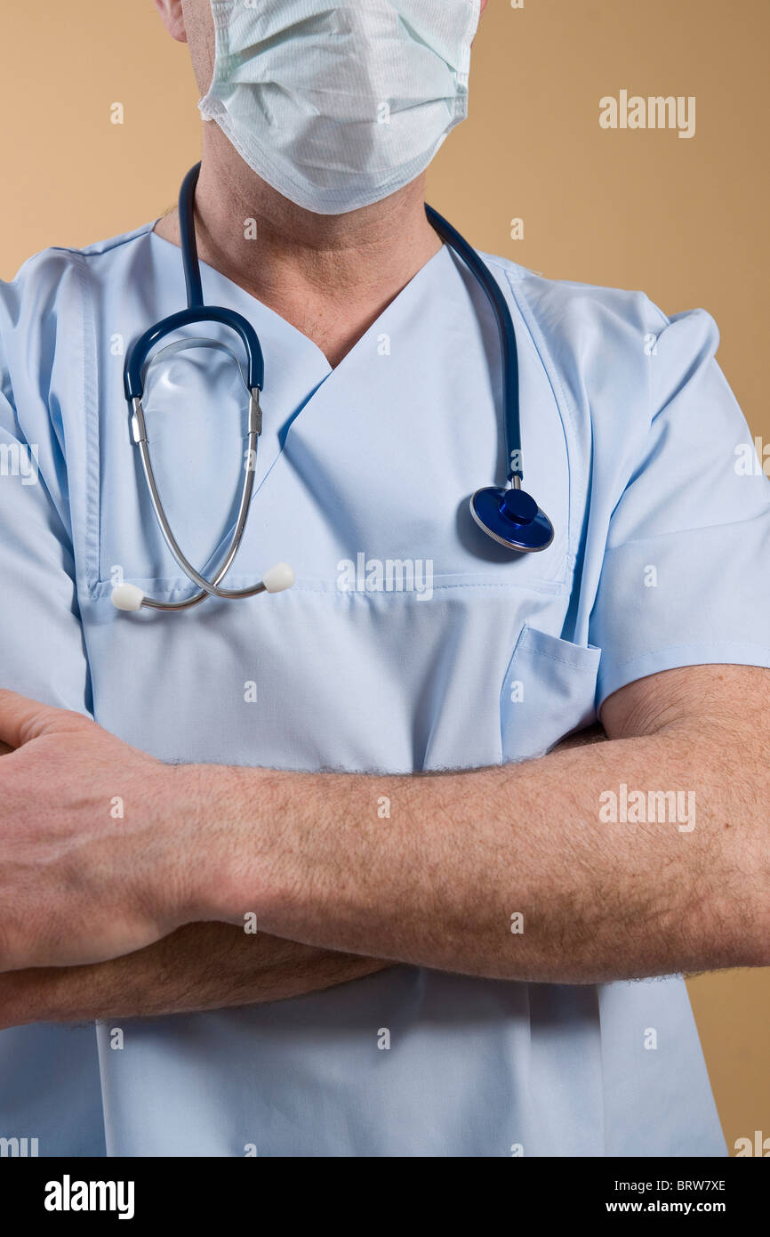 Truncated portrait of a doctor with a stethoscope and a face mask Stock ...