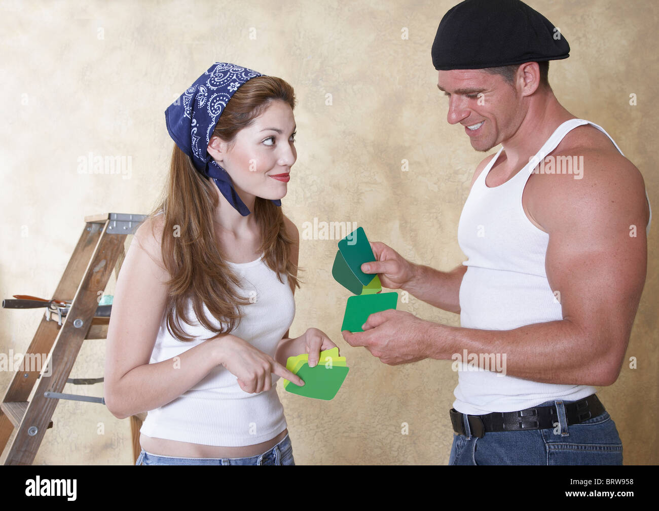 Couple looking at color samples Stock Photo - Alamy