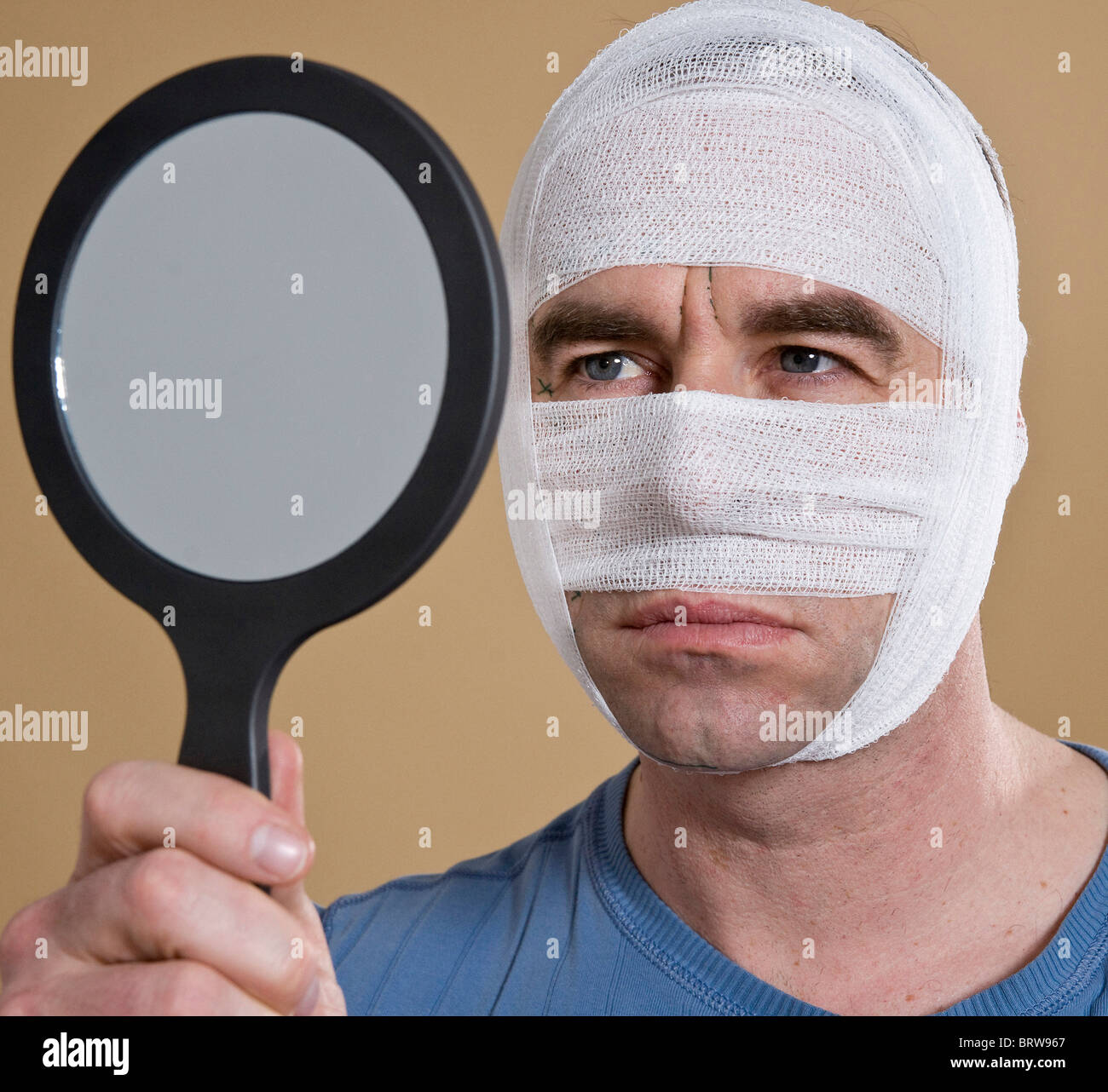 Man bandages face hi-res stock photography and images - Alamy