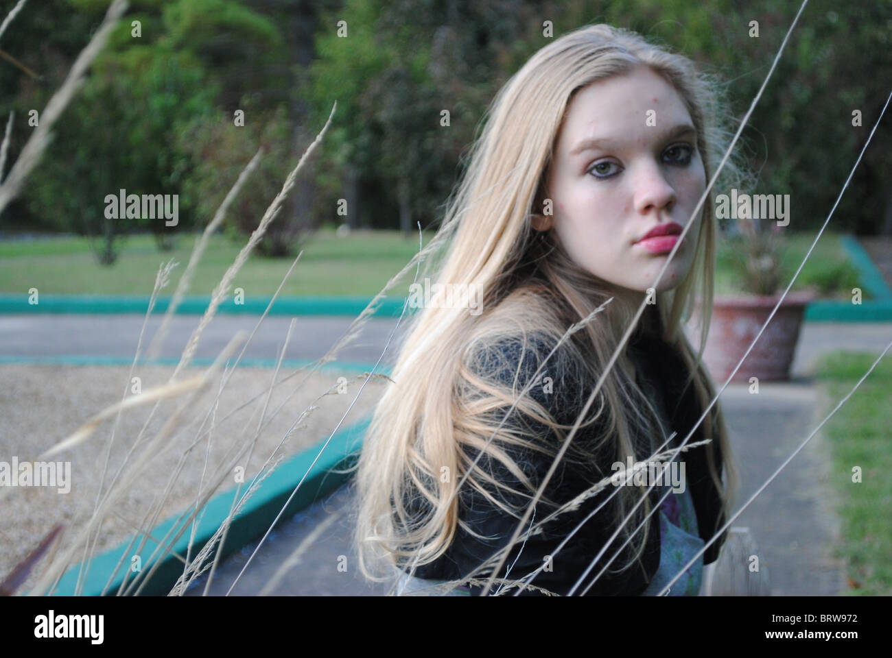 Sullen blonde girl outside hi-res stock photography and images - Alamy