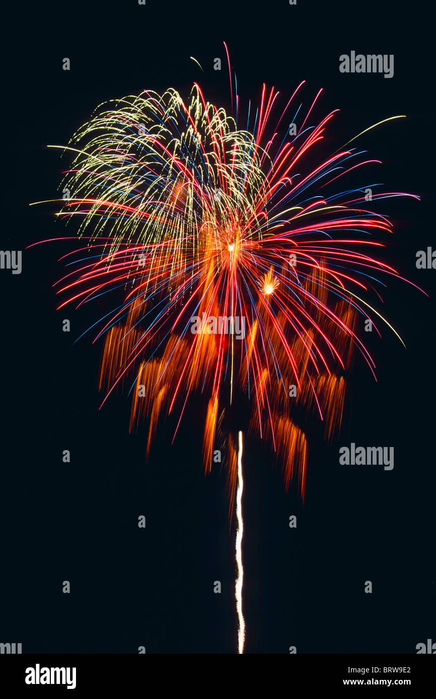 Fireworks light up the night time sky Stock Photo - Alamy