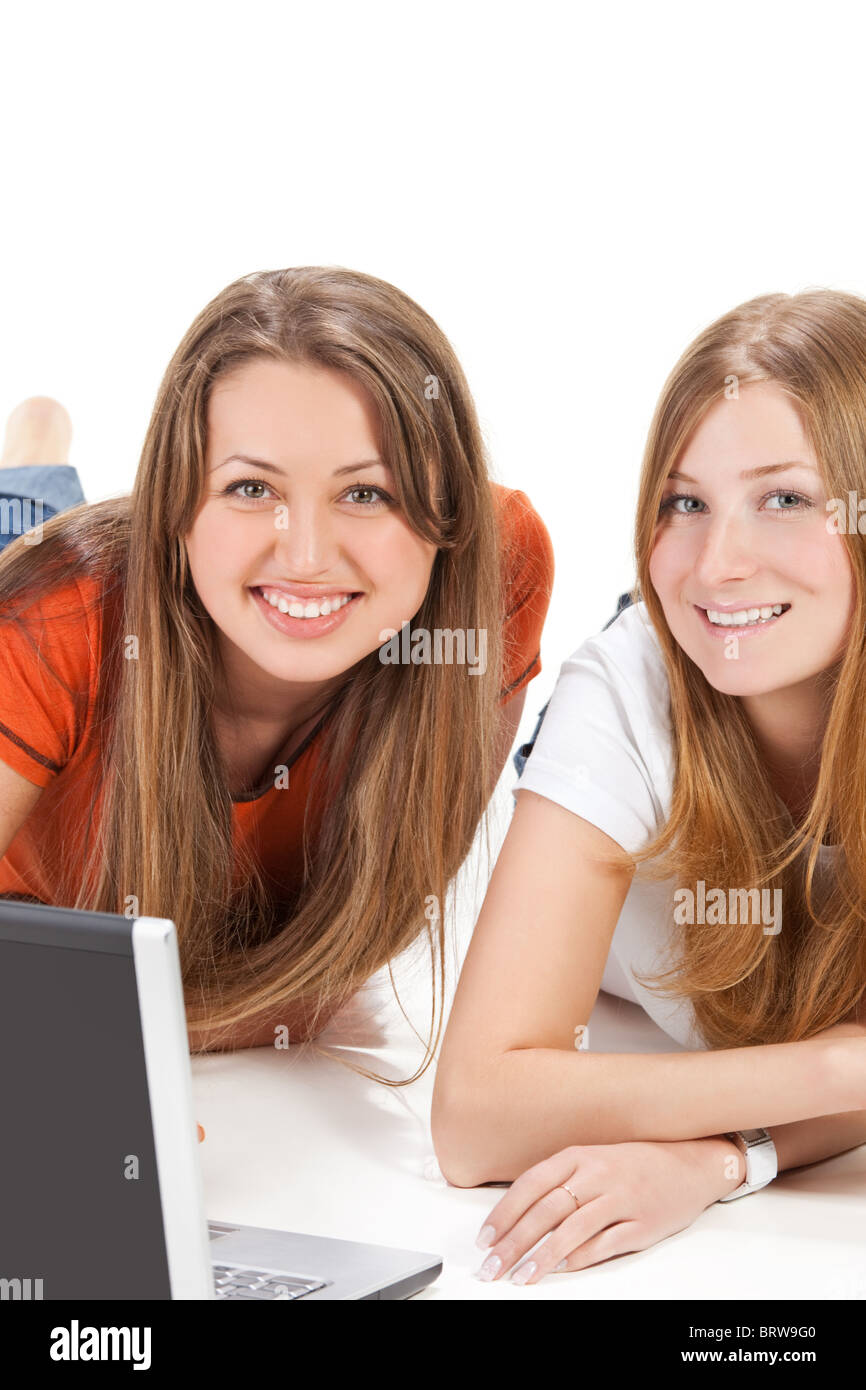 two young happy student girl work on laptop computer isolated on Stock ...