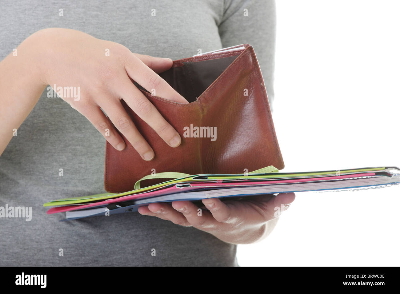 Young caucasian woman with empty wallet - broke concept Stock Photo - Alamy