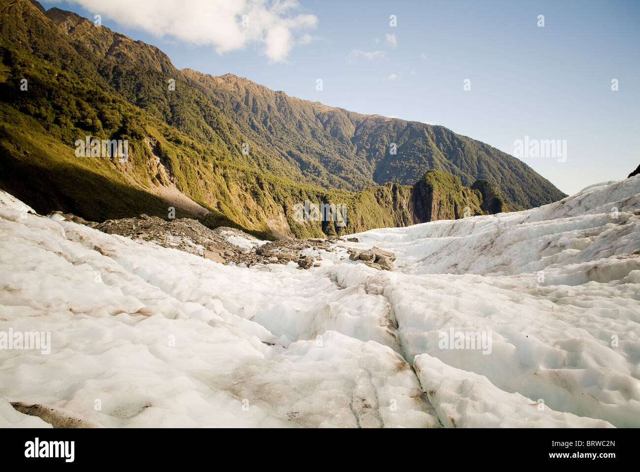 Rock, snow and ice on a glacier Stock Photo - Alamy