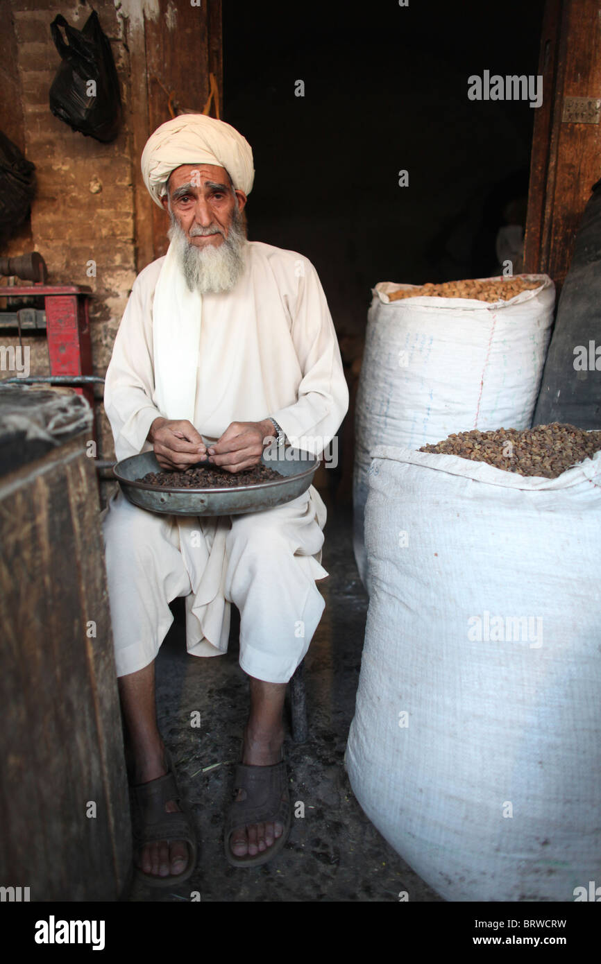 old shopkeeper in Afghanistan Stock Photo - Alamy