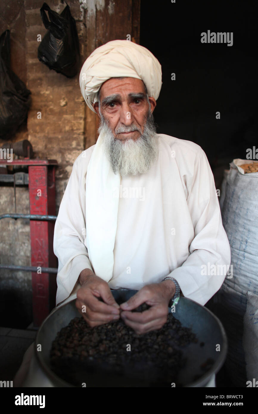 old shopkeeper in Afghanistan Stock Photo - Alamy