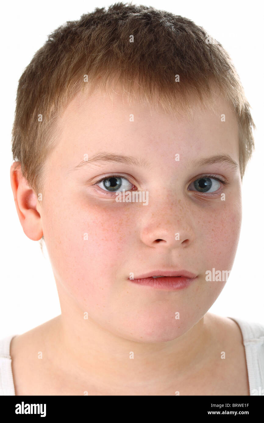 Head and shoulders portrait of a small boy isolated on white Stock ...