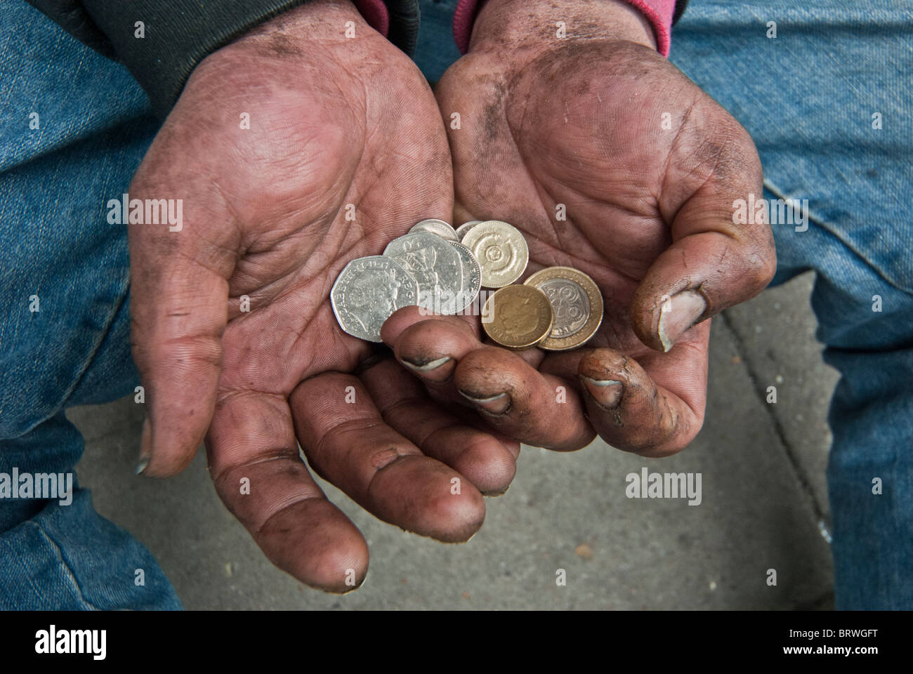 HOMELESS PERSON HOW MUCH CASH HE EARNED Stock Photo - Alamy