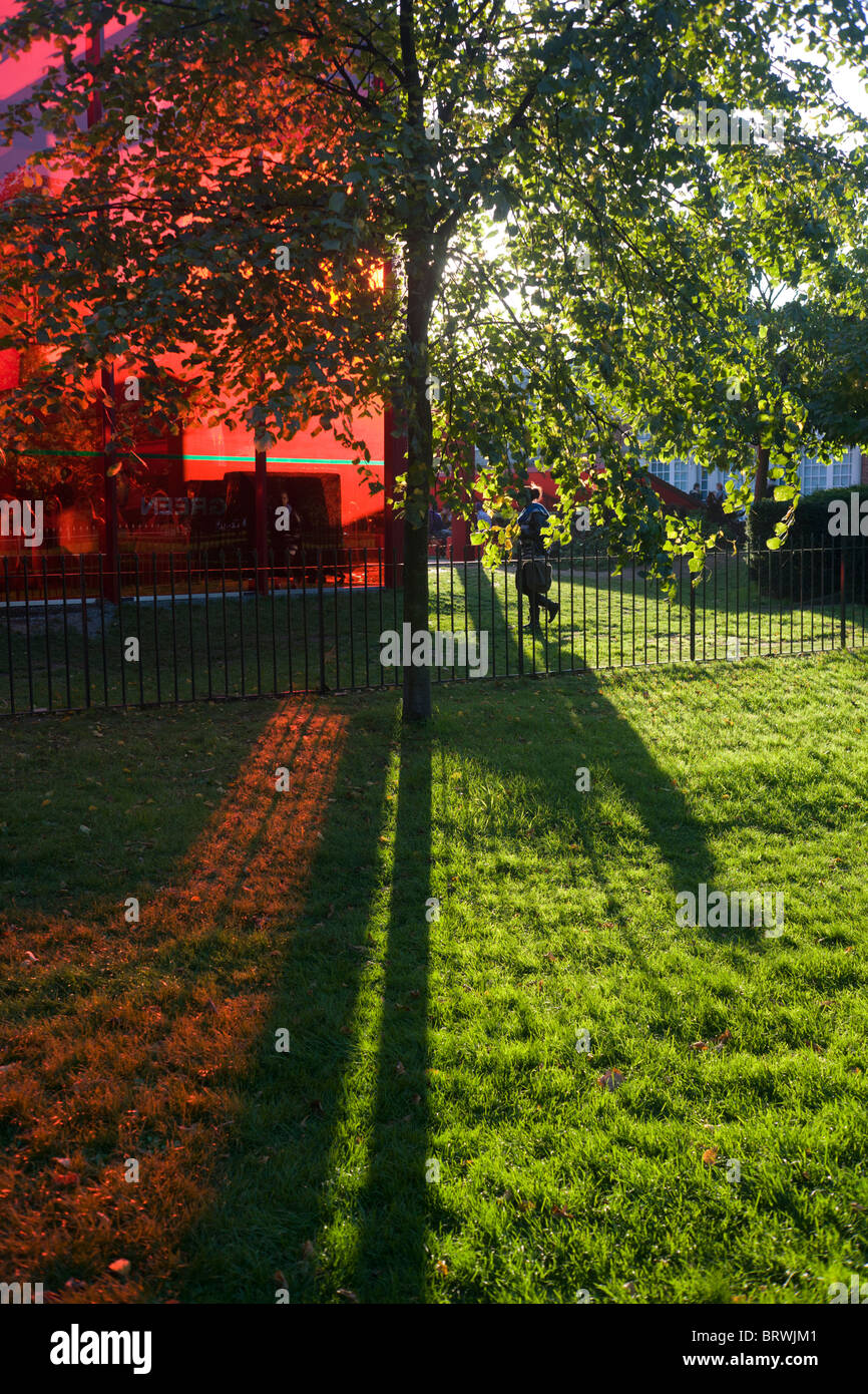 Red-tinted landscape against green grass caused by the Serpentine ...