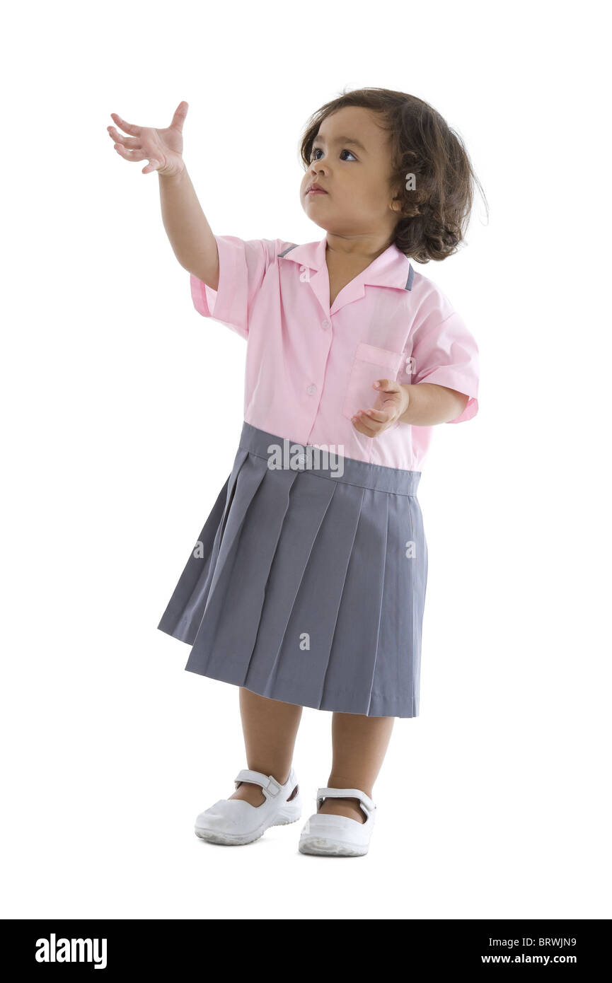 cute girl taking something, isolated on white background Stock Photo ...